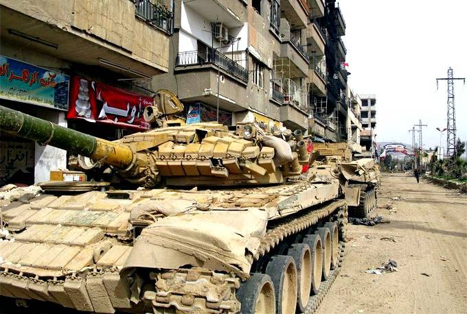 Militants smoked from a den in Darayya